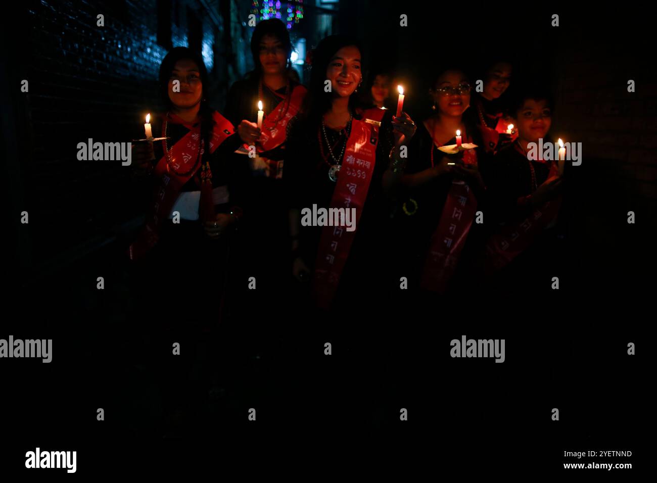 Lalitpur, Nepal. 1st Nov, 2024. Women in traditional attire hold ...