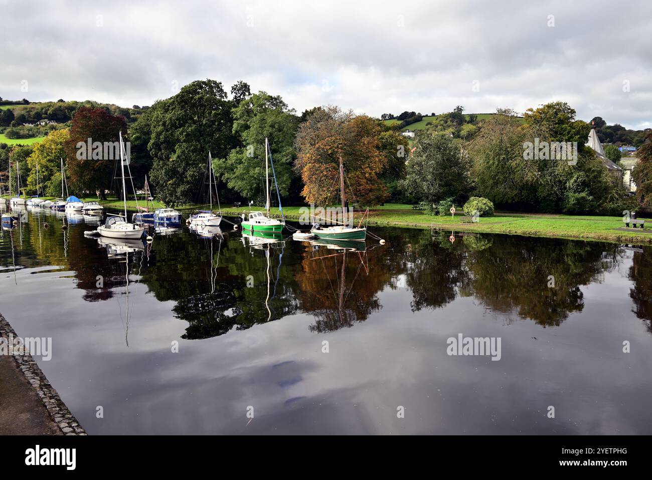 Reflections in the river Dart at Totnes, South Devon, alongside Vire ...