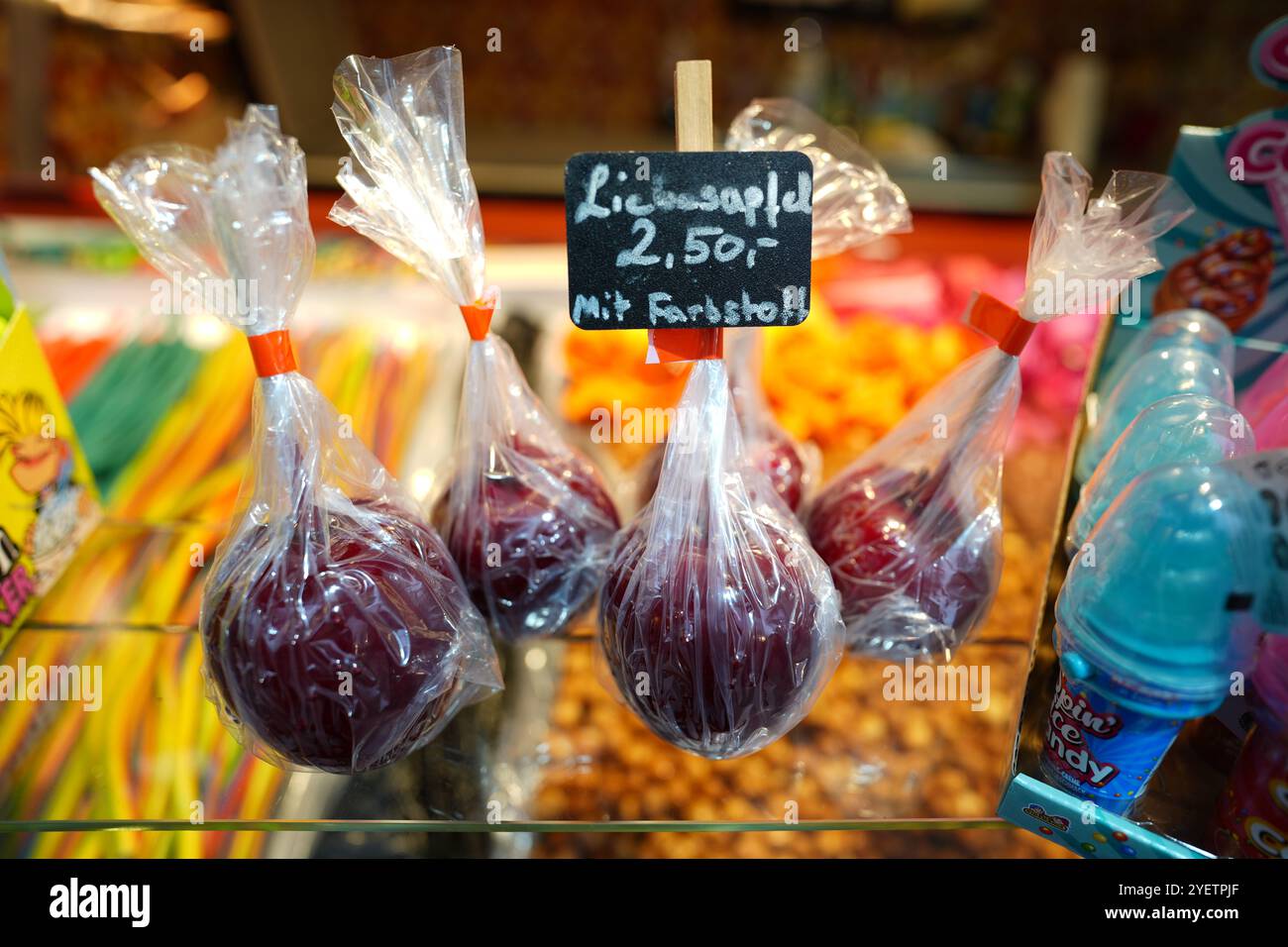 Hamburg, Germany. 01st Nov, 2024. Candy apples are on display at a ...
