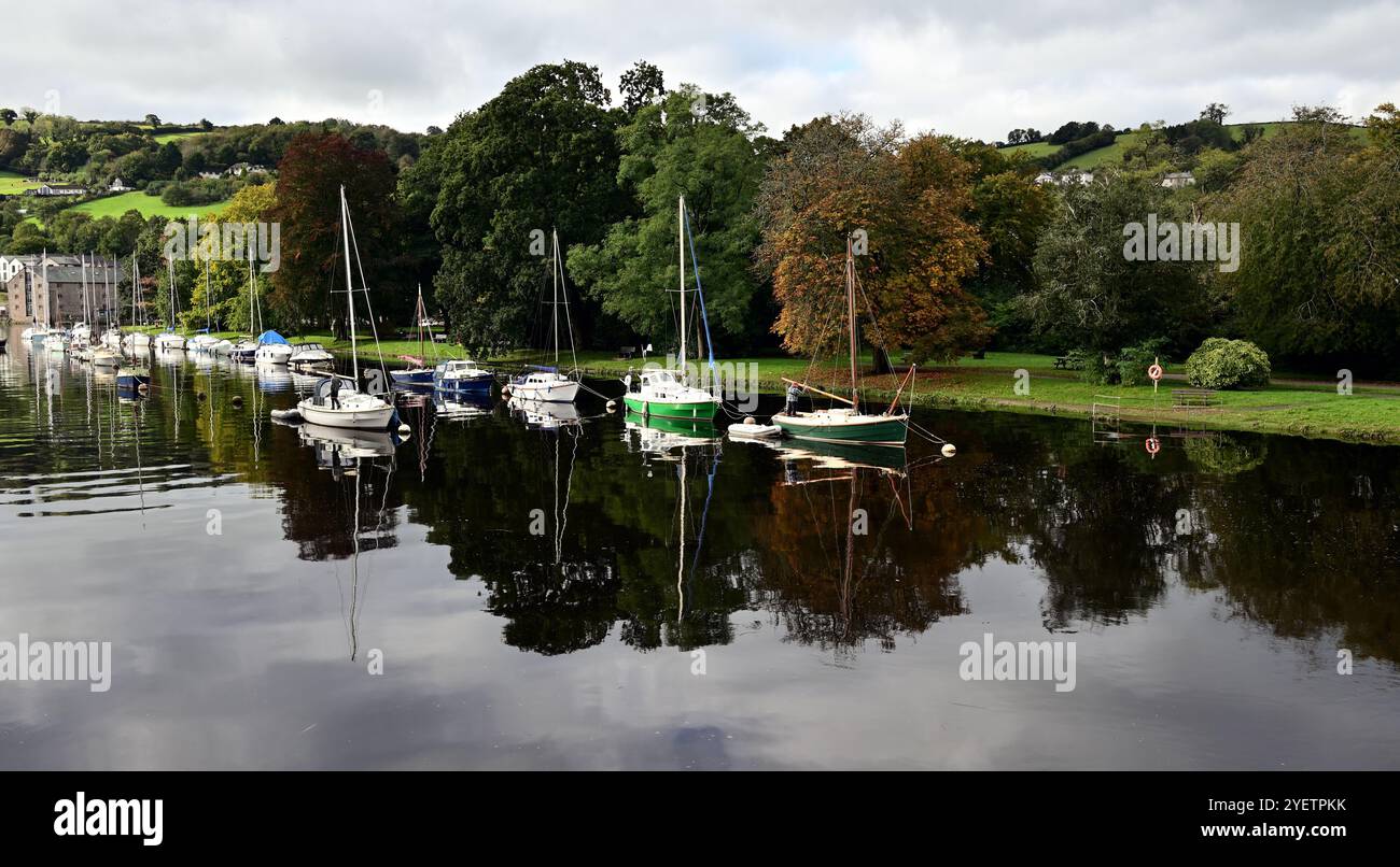 Reflections in the river Dart at Totnes, South Devon, alongside Vire ...