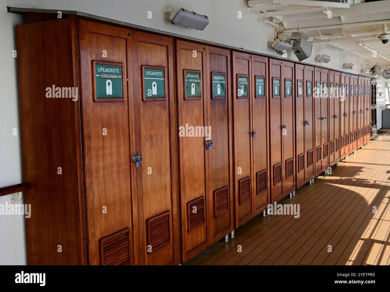 Lifejacket storage cupboards on the promenade deck of a P&O cruise ship ...
