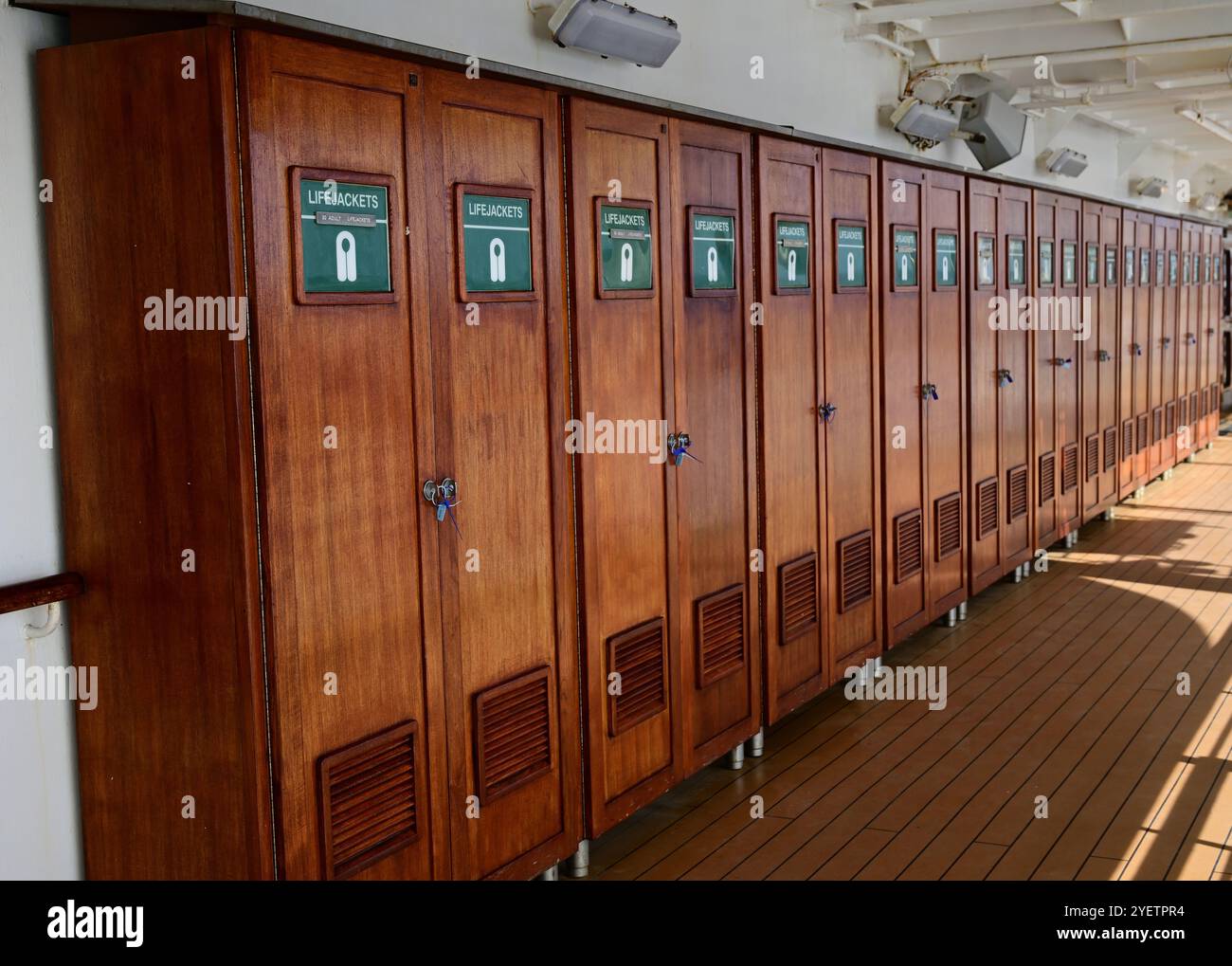 Lifejacket storage cupboards on the promenade deck of a P&O cruise ship ...