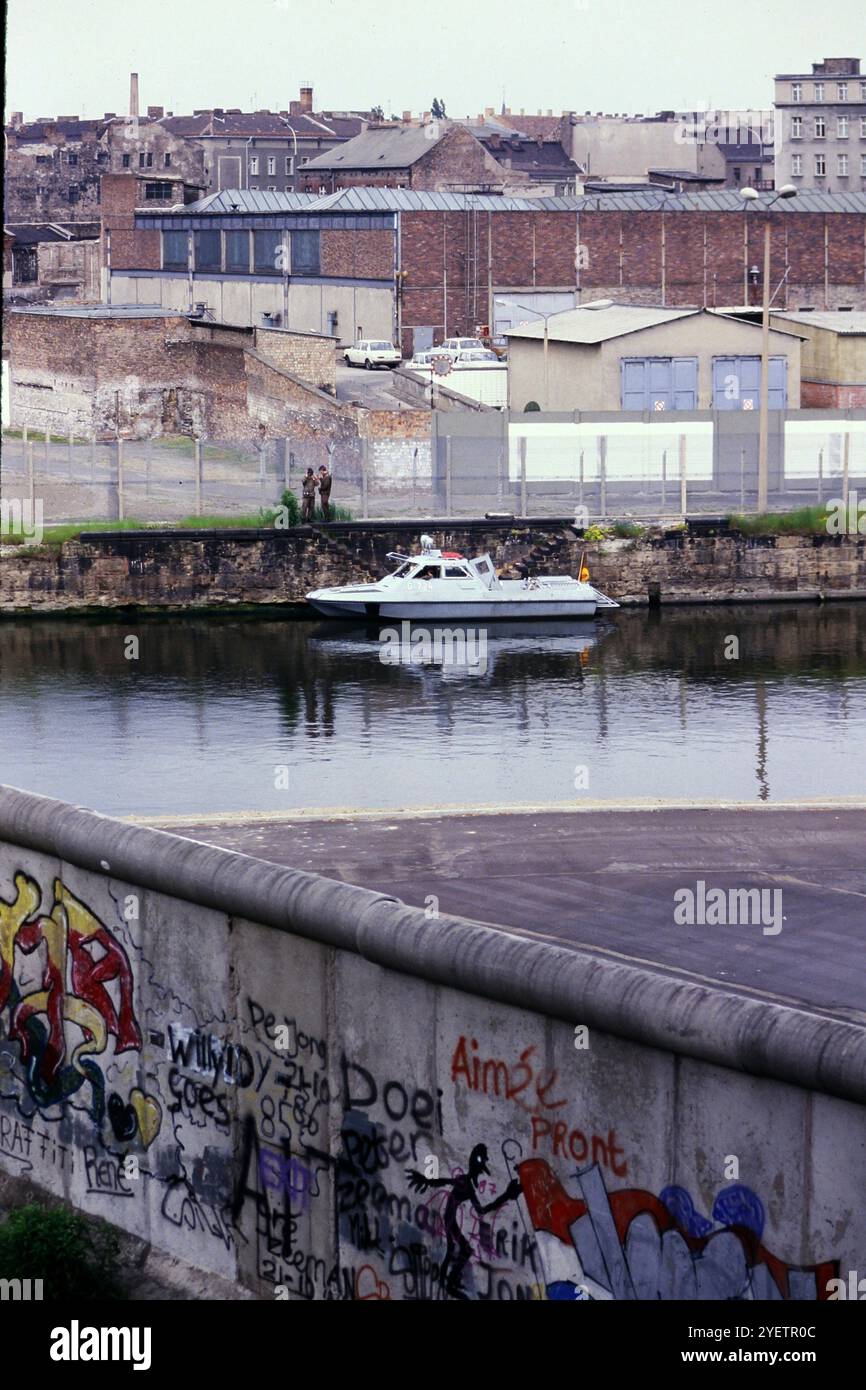 A loom over The Berlin Wall into East Germany in 1987 Photo by Dennis ...