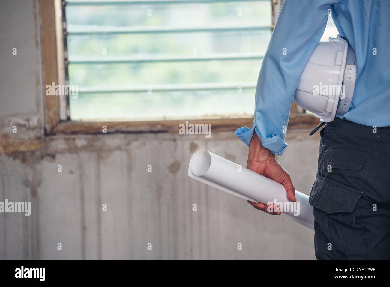 Engineer arm hands holding hardhat white work helmet hard hat for Civil ...