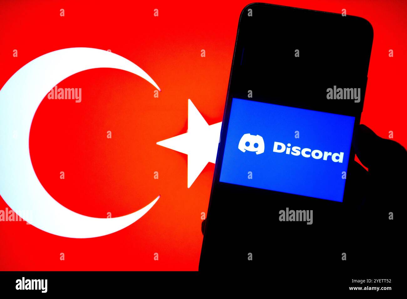 In this photo illustration, a Discord logo seen displayed on a ...