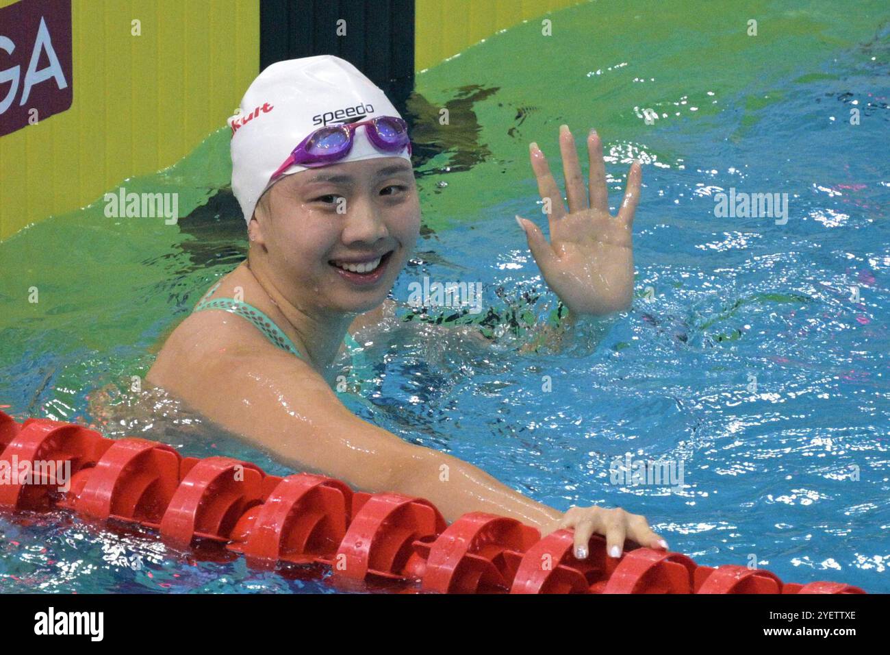 Singapore. 1st Nov, 2024. Tang Qianting of China celebrates after the ...
