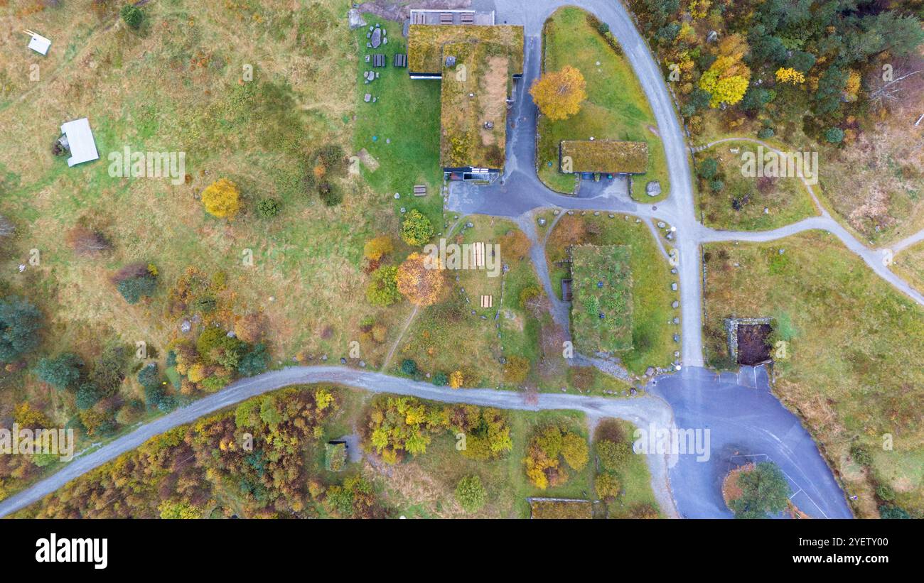 Aerial view of a rural area with buildings featuring green roofs ...