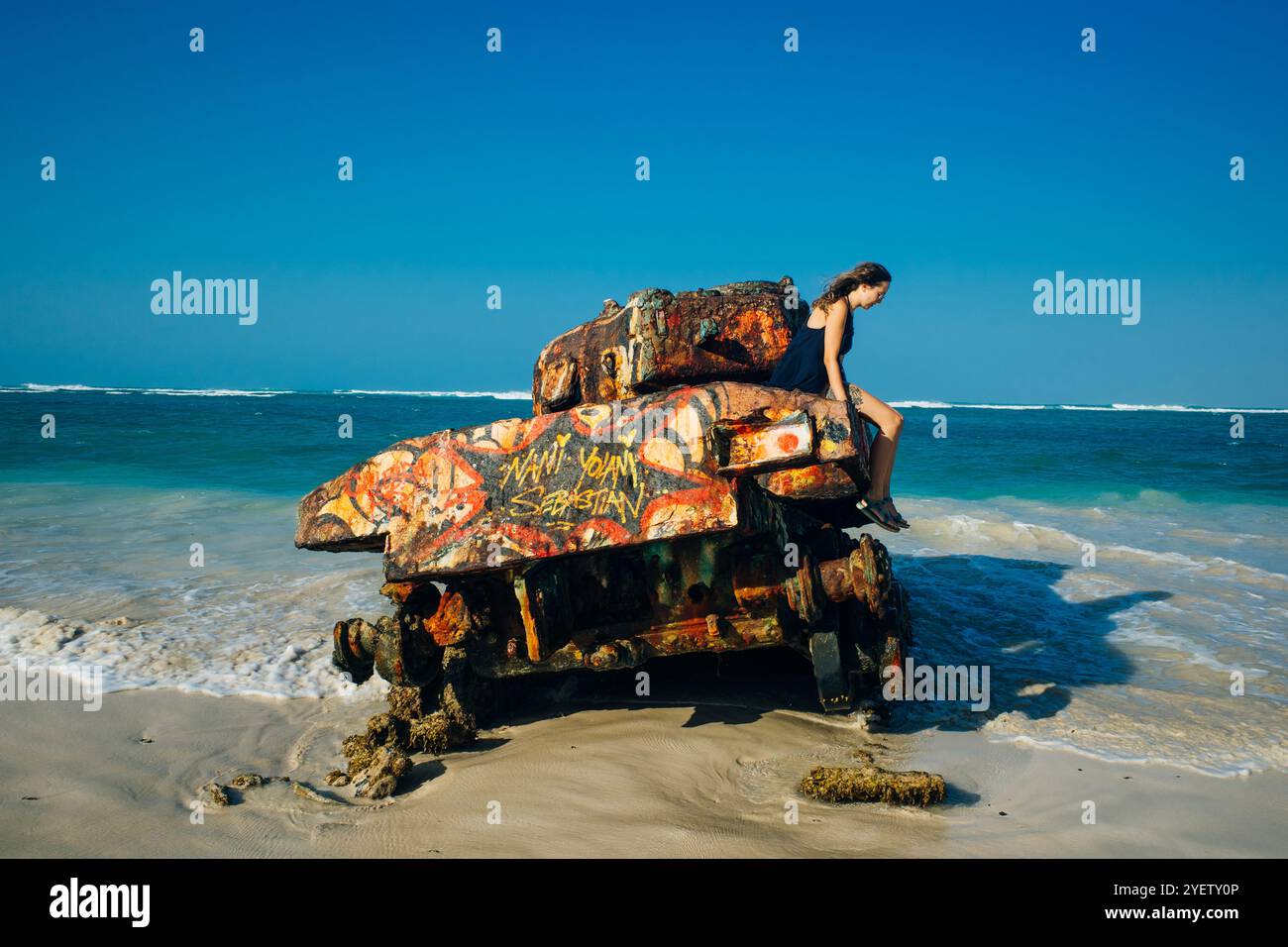 The old rusted and deserted military tank of Flamenco beach on the ...