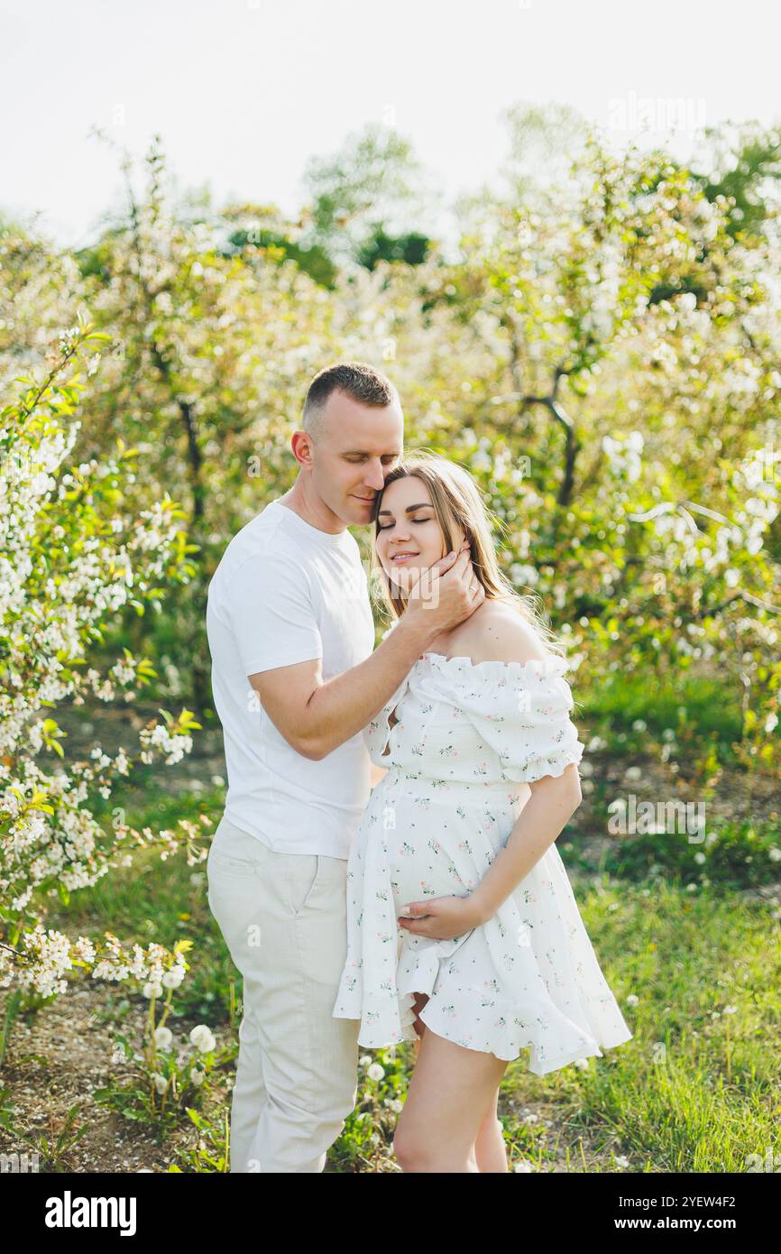 The concept of happy family relationships. A young happy couple in ...