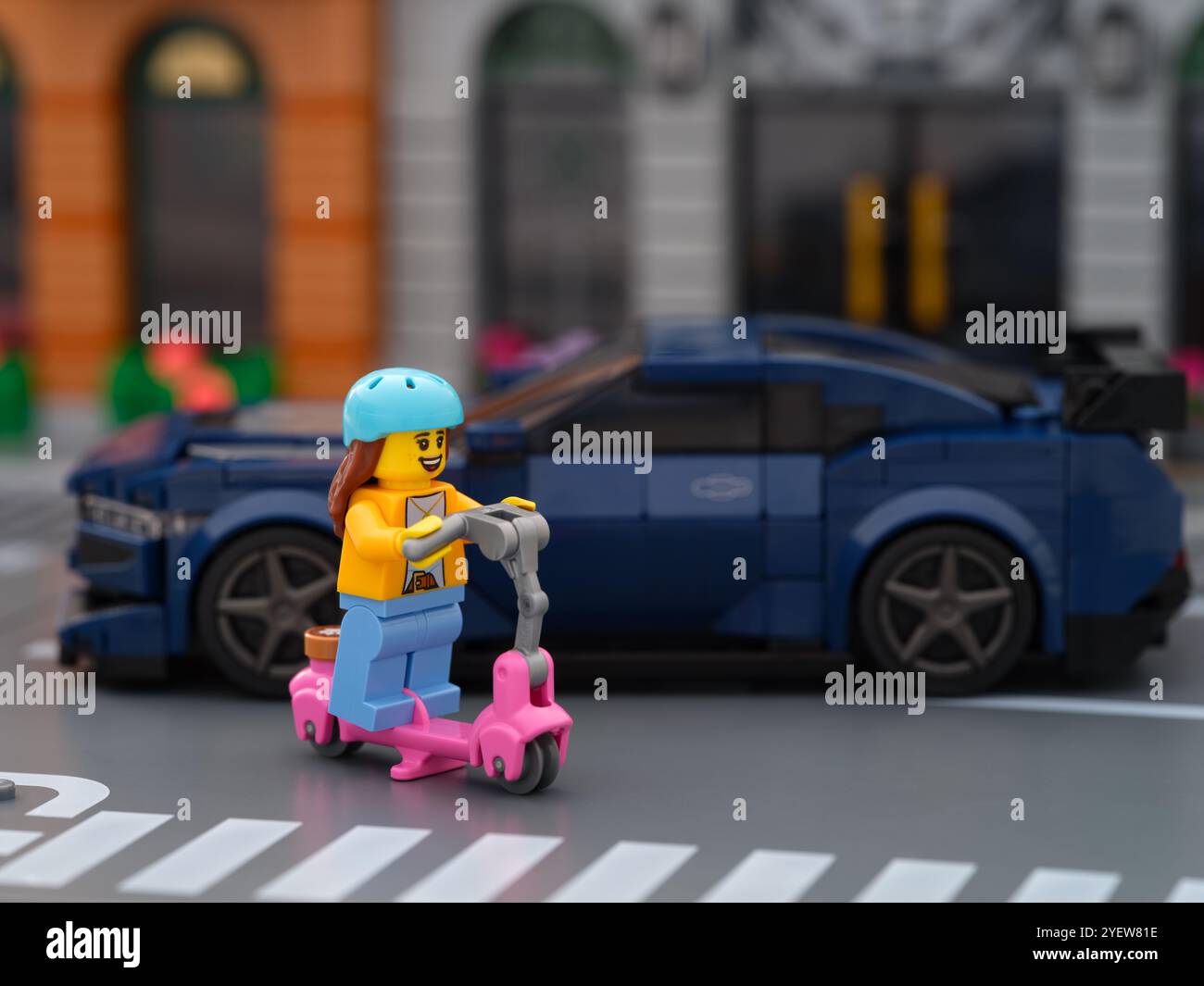Girl riding a toy car hi-res stock photography and images - Alamy