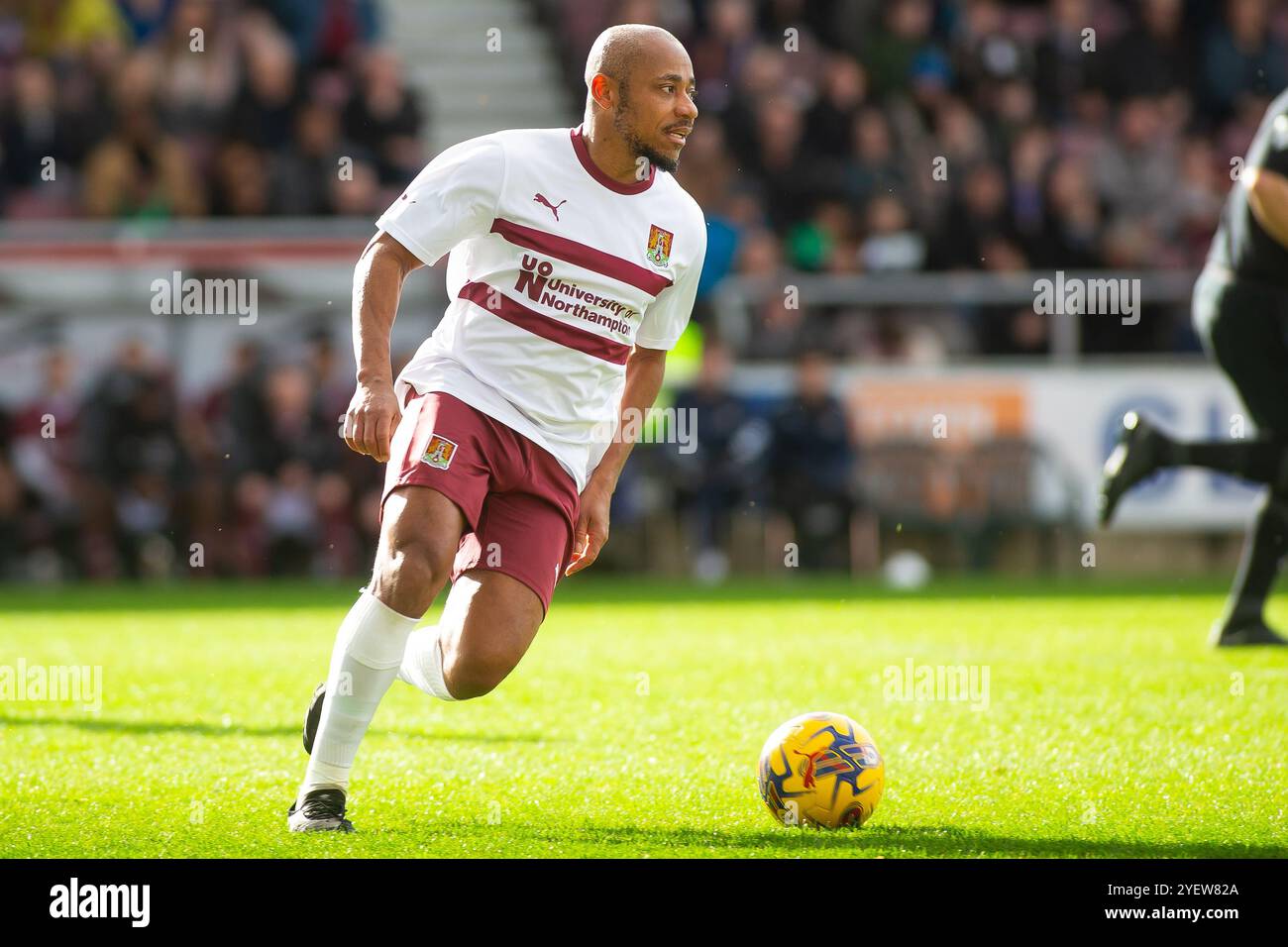 Northampton, England - Mar 17 2024: Derek Asamoah turns with the ball ...