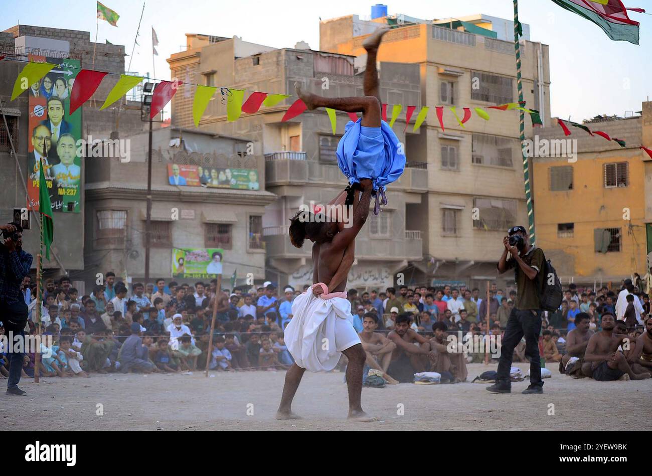 Wrestlers in action during the Sindh traditional wrestling Malh on the ...