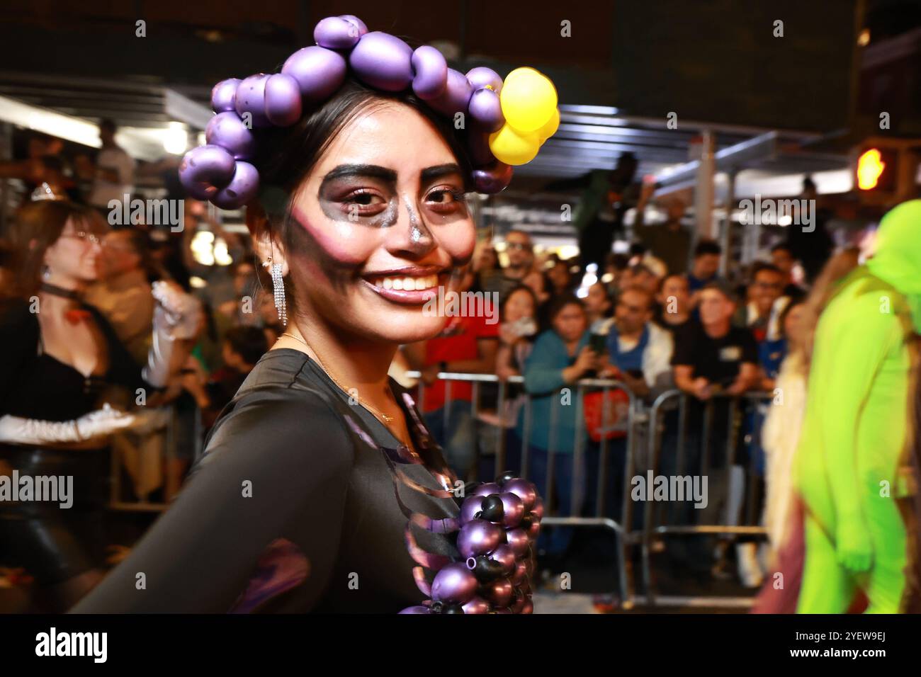 Women with calaveras makeup celebrating Día de Muertos march during the ...
