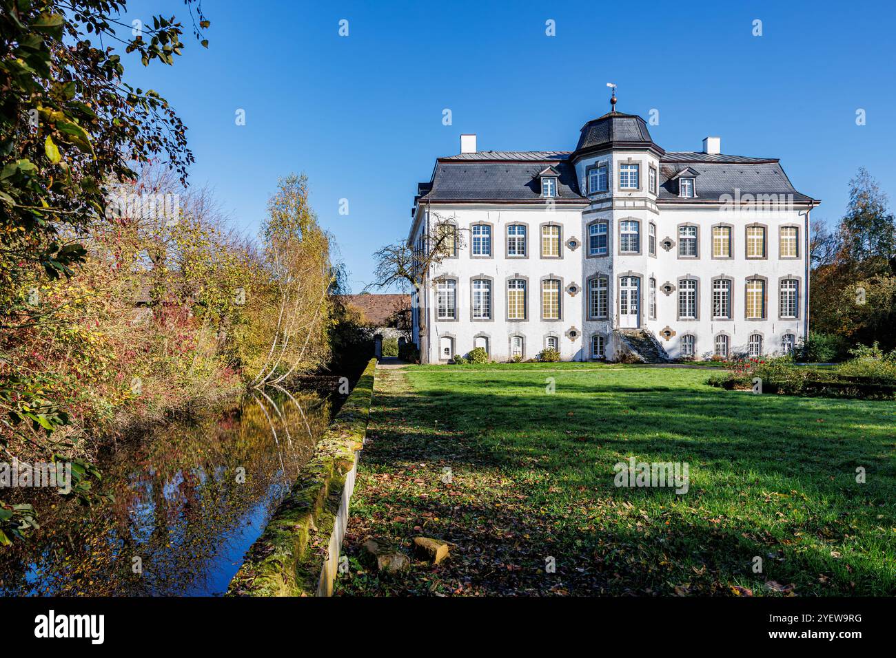Back garden of former classicist Zweibrucken Castle, moat, white walls ...