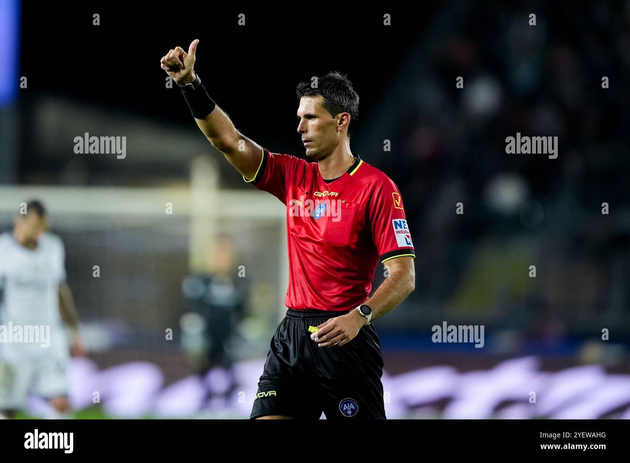 Referee Matteo Marchetti gestures during the Serie A Enilive match ...