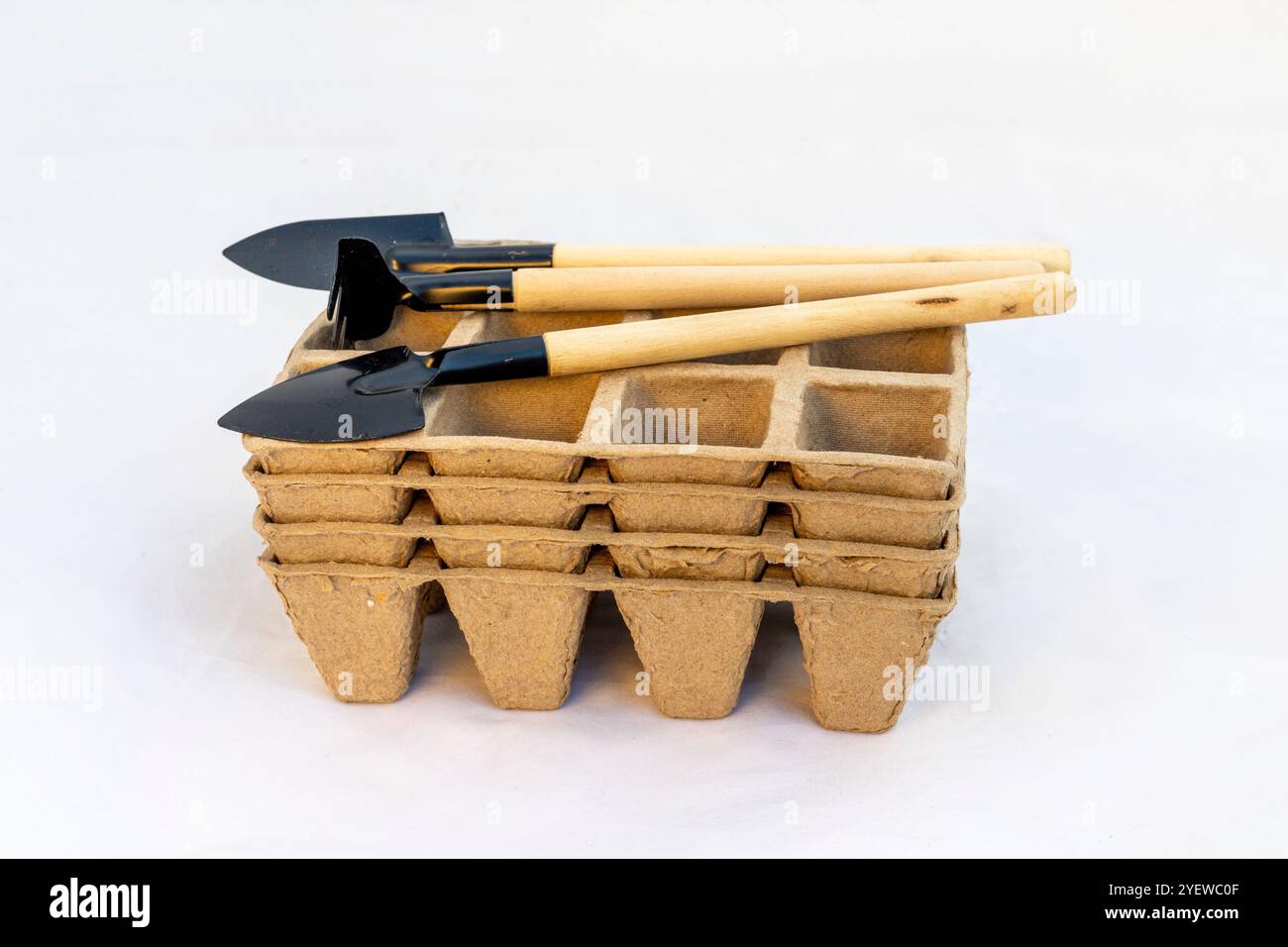 Biodegradable Seed Starter Tray Stack with Mini Gardening Shovels Stock ...