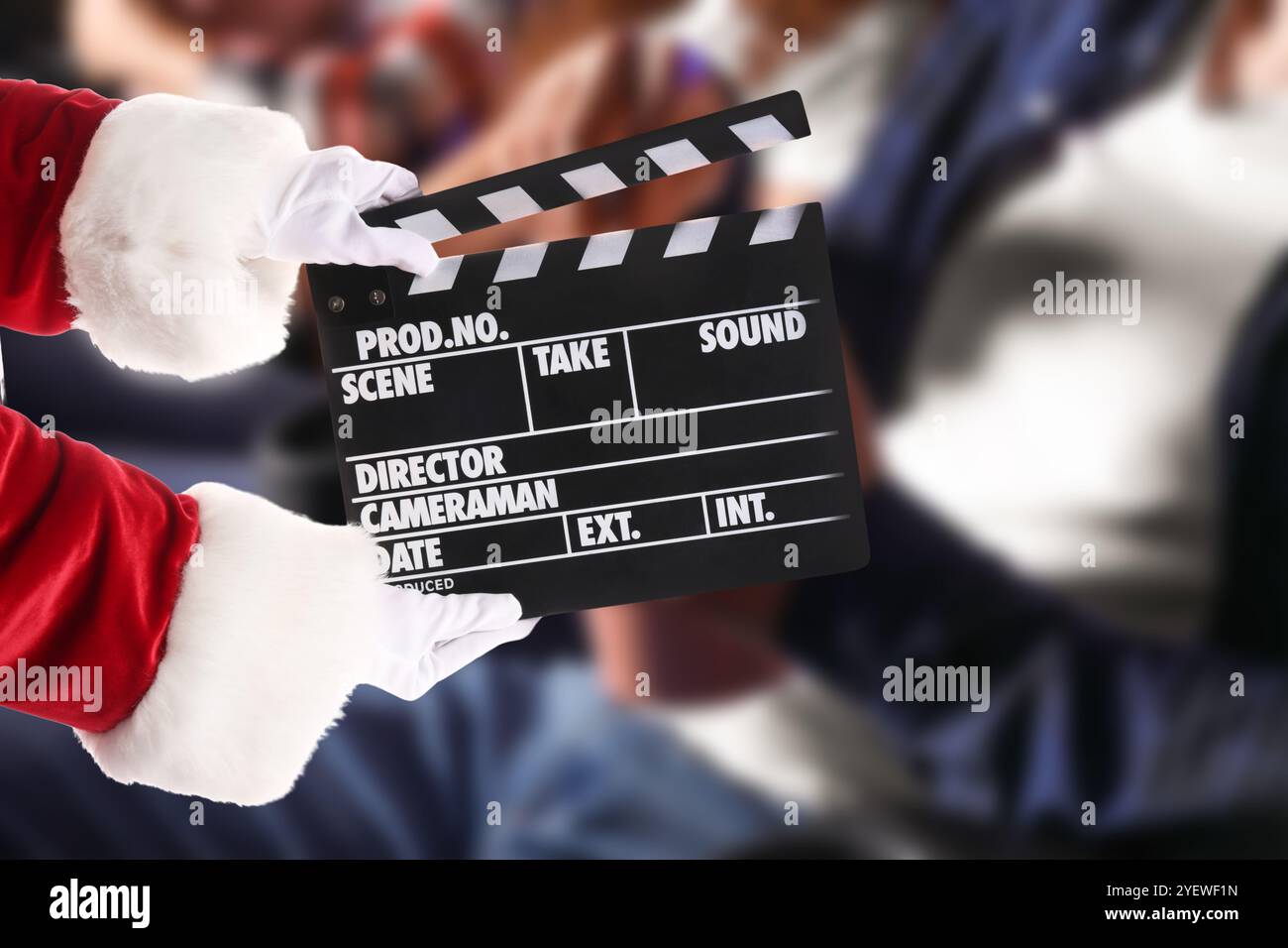 Santa with clapperboard in cinema. Christmas movie concept Stock Photo ...