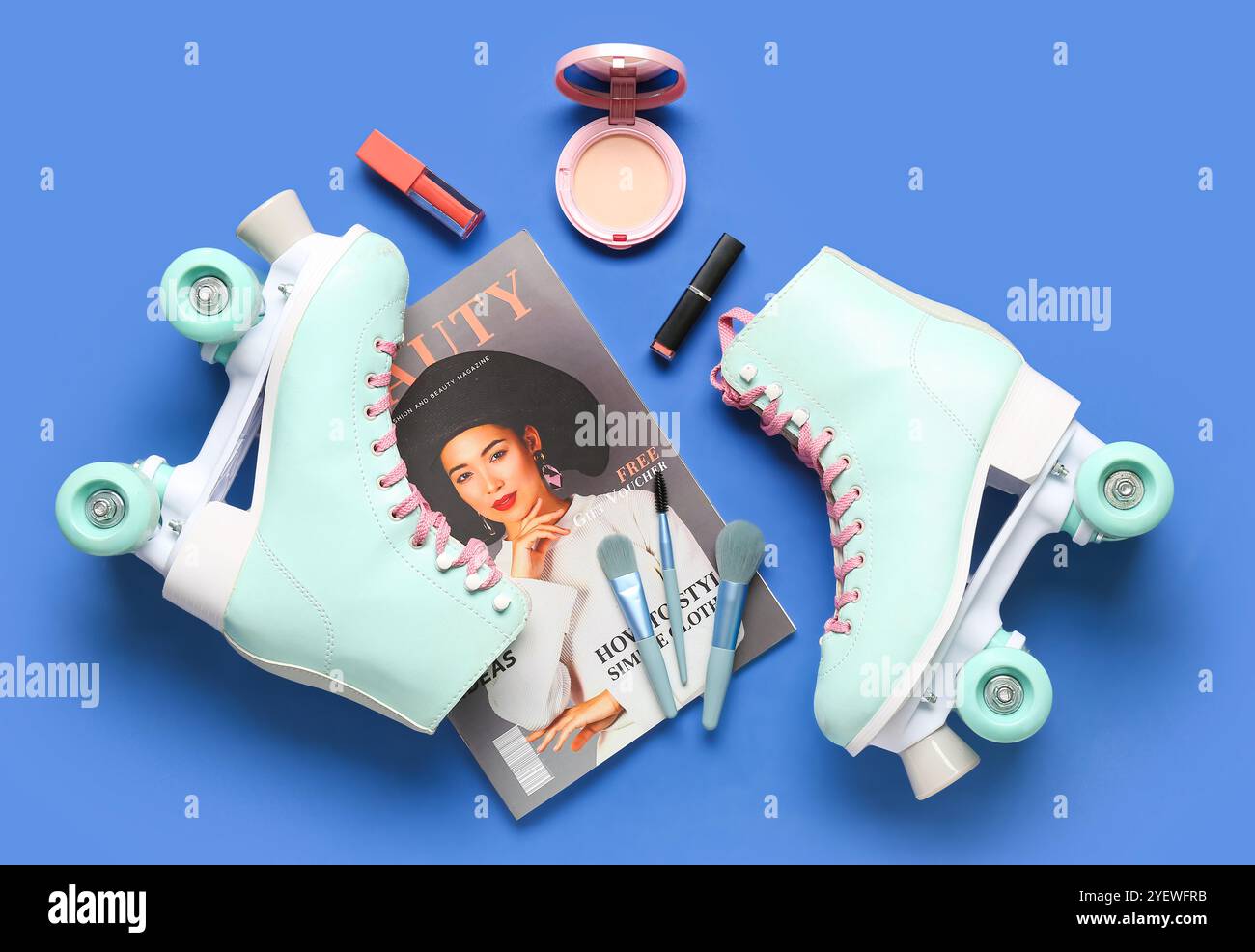 Composition with pair of vintage roller skates, magazine and cosmetic ...