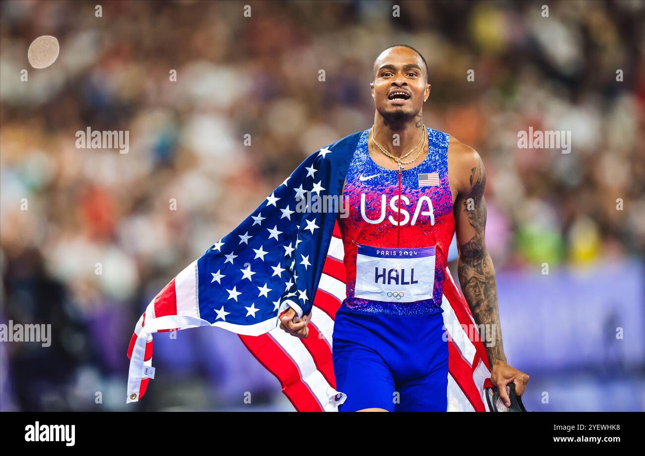 Quincy Hall celebrating her victory with her country's flag at the ...
