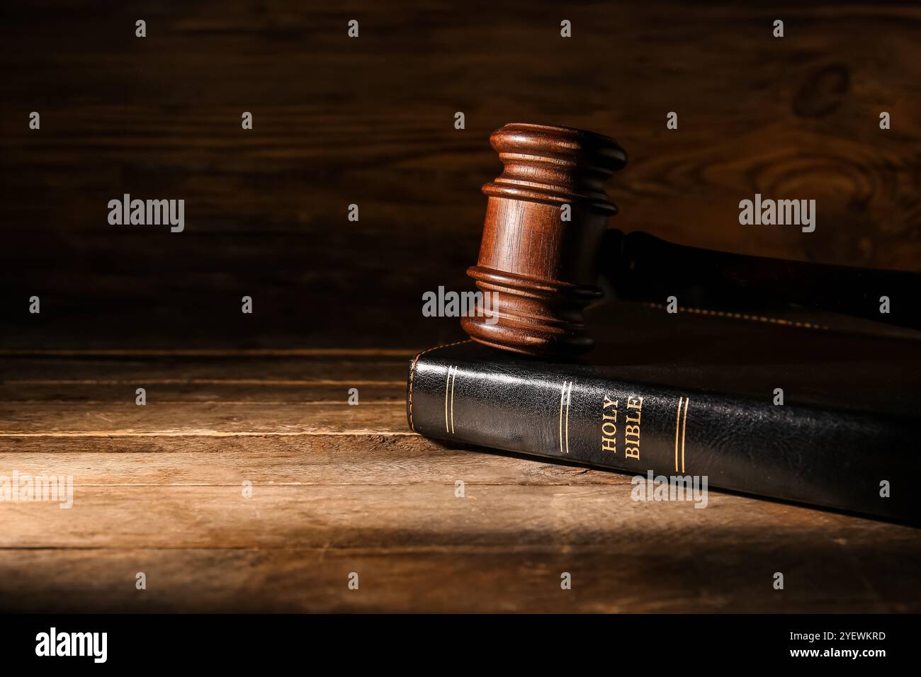 Holy Bible with judge's gavel on dark wooden background Stock Photo - Alamy