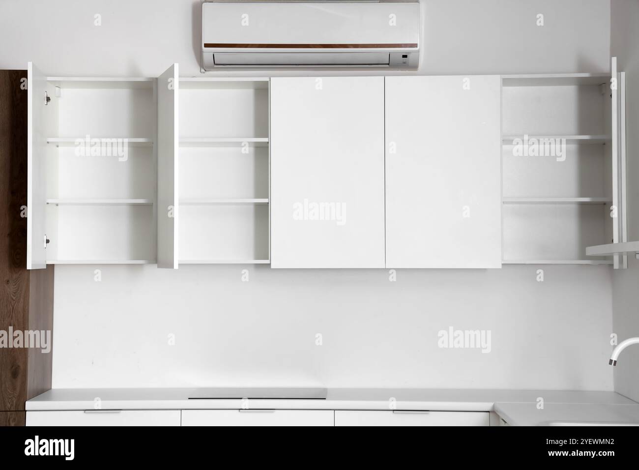 Open cupboards with shelves in light kitchen Stock Photo - Alamy