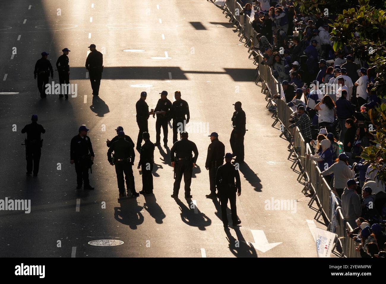 Police officers patrol the streets before the Los Angeles Dodgers ...