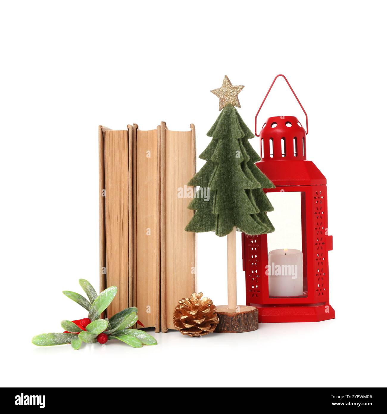Composition with books, Christmas decorations and lantern on white ...