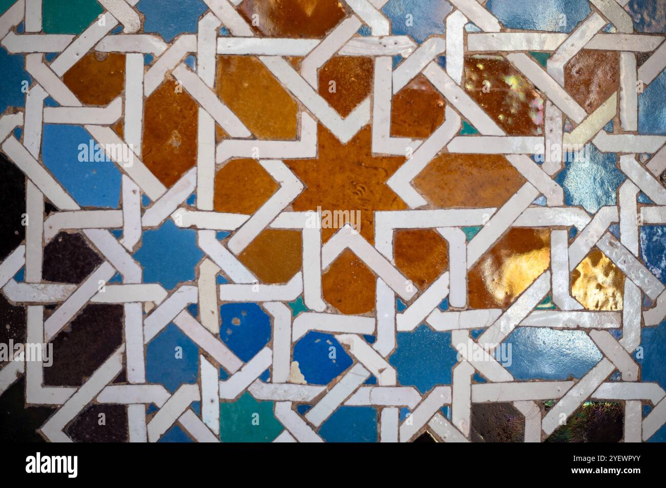 Ornamental colourful geometric medieval ceramic tiles of walls in old ...