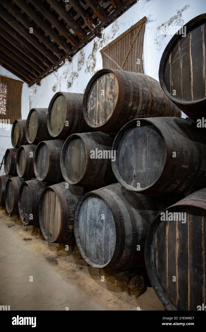 Solera systems in old Andalusian wine cellar, process for aging sherry ...