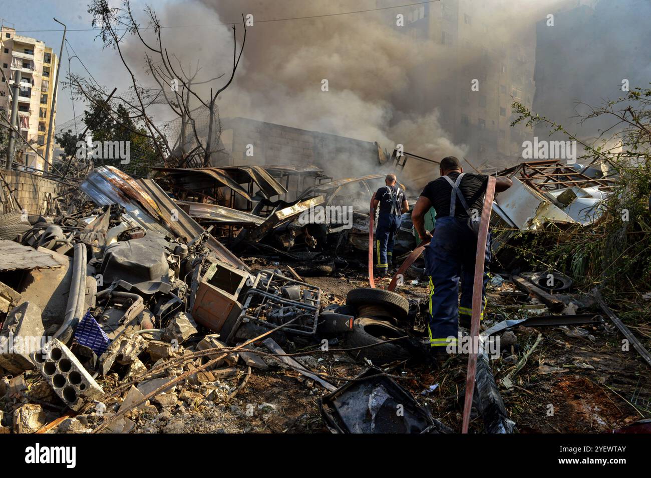 November 1, 2024, Beirut, Beirut, Lebanon: Fire fighters push their way ...