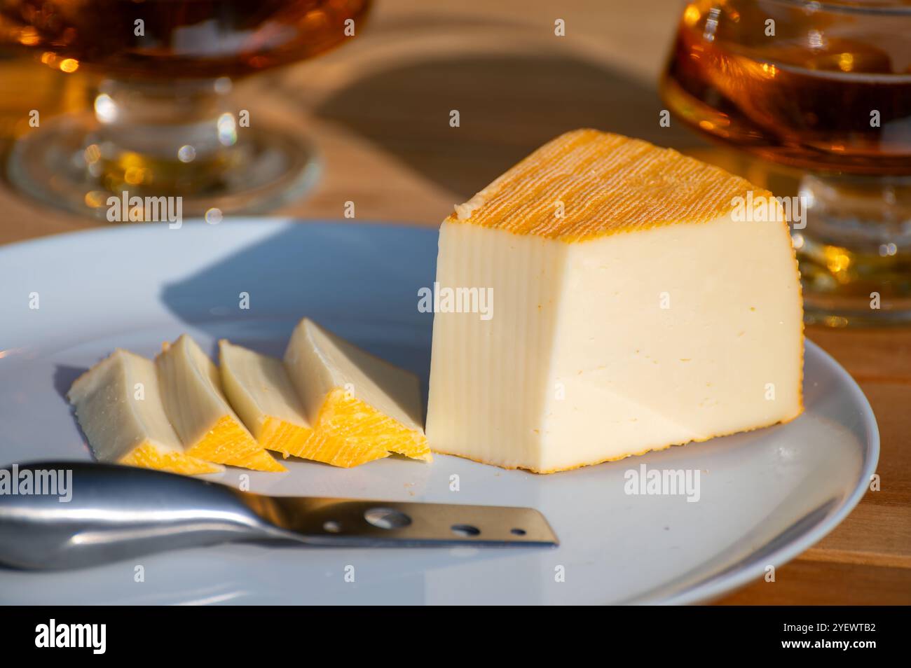 Piece of Saint Paulin creamy, mild, semi-soft French cheese made from ...