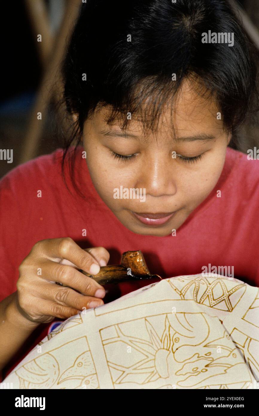 Young Women Engaged In The Making of a Bathik Stock Photo - Alamy