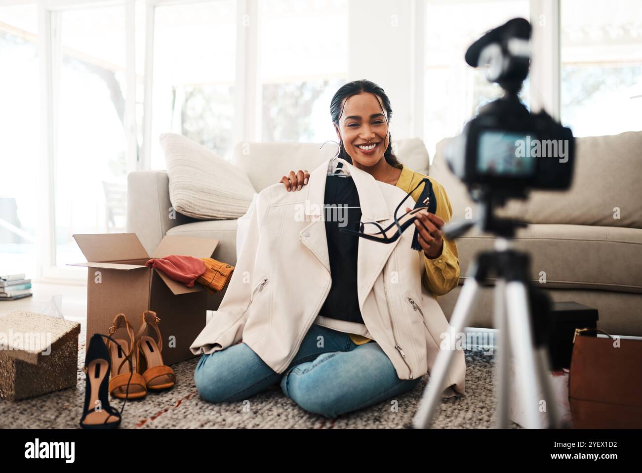 Fashion, unboxing and woman for live stream, content creation or online ...