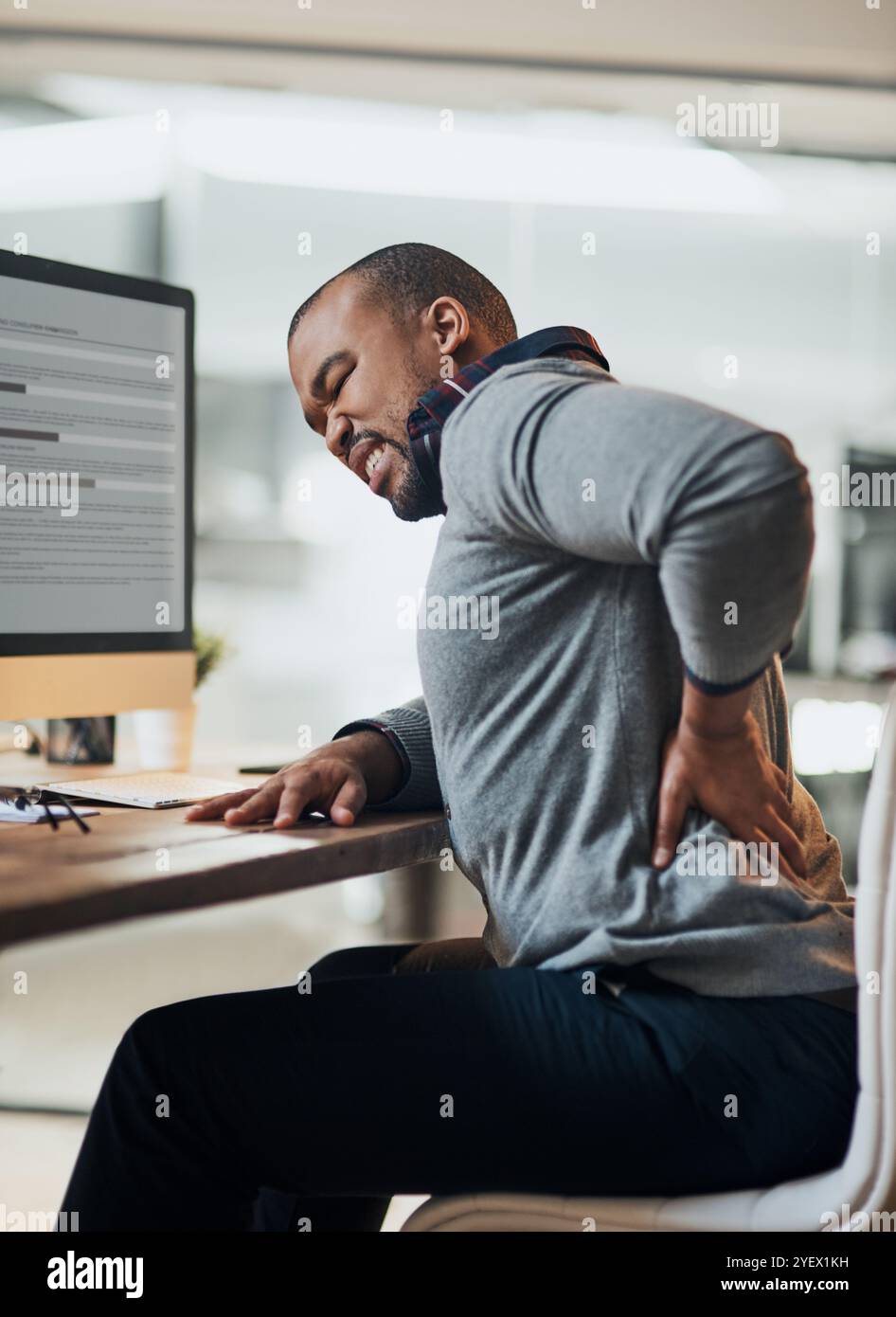 Business man, computer and back pain with working in office on tech ...