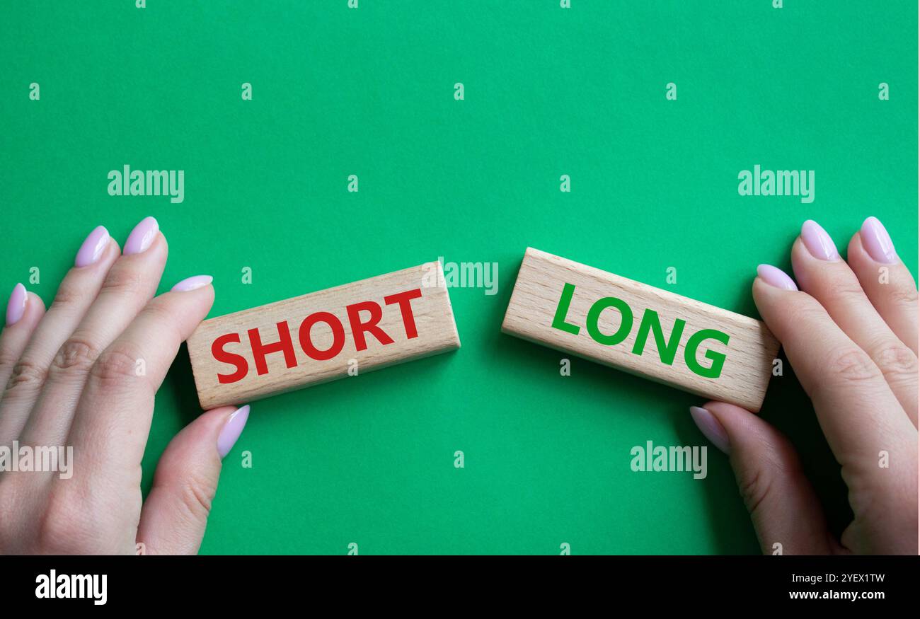 Short vs Long symbol. Concept word Short vs Long on wooden blocks ...