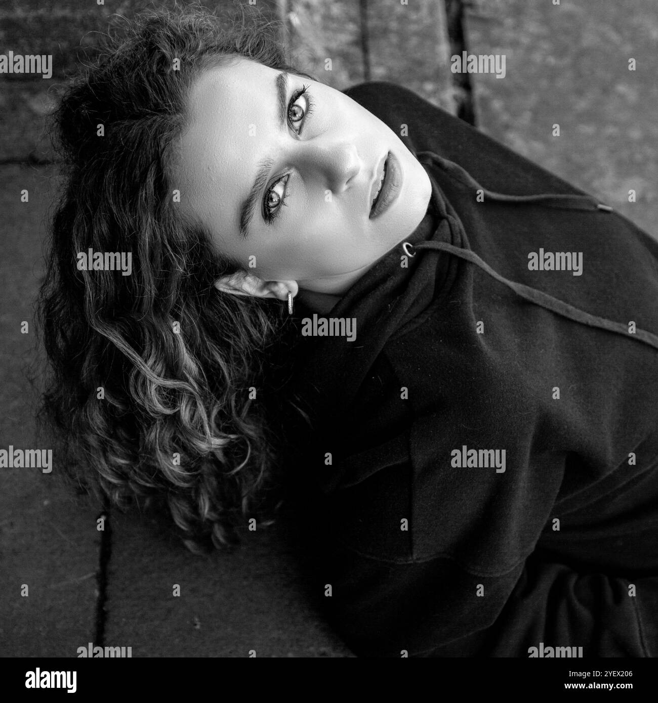 Attractive woman relaxes in Black and White Stock Photos & Images - Alamy