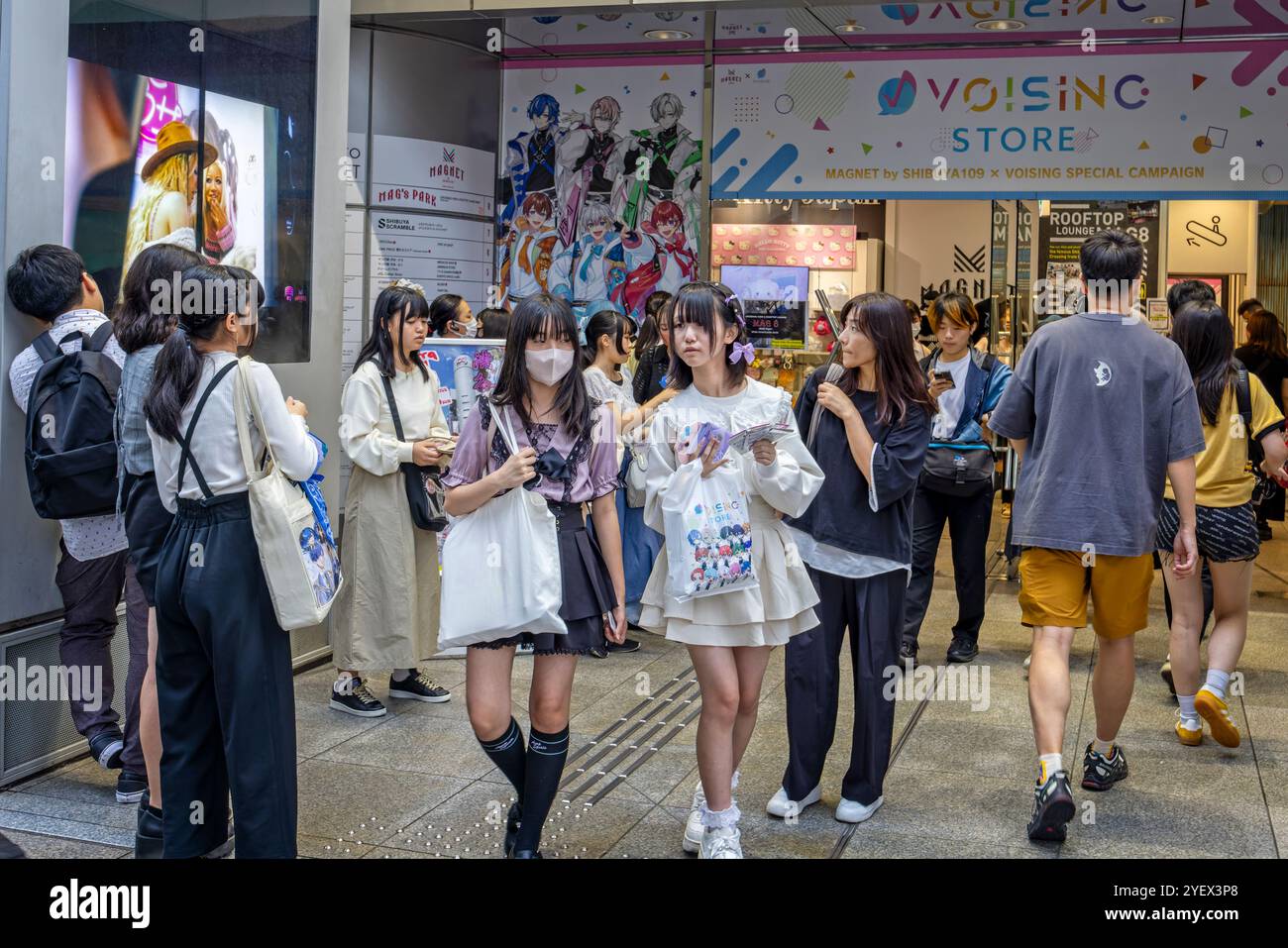 YoungJapanese girls in mini skirts coming out of Voising store in Tokyo, Japan on 6 Ocotber 2024 ...
