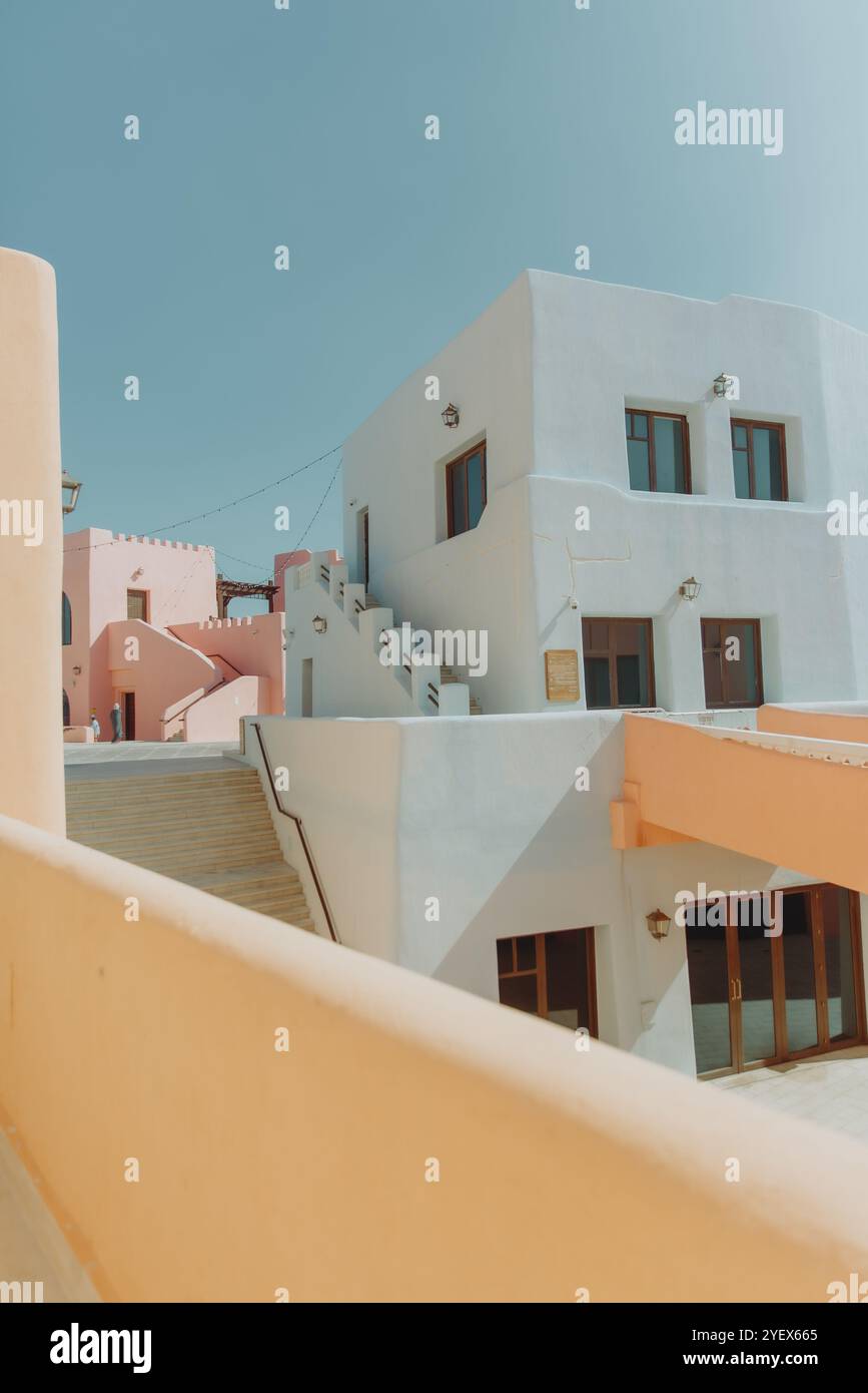 Pastel color architecture building with blue sky Stock Photo - Alamy