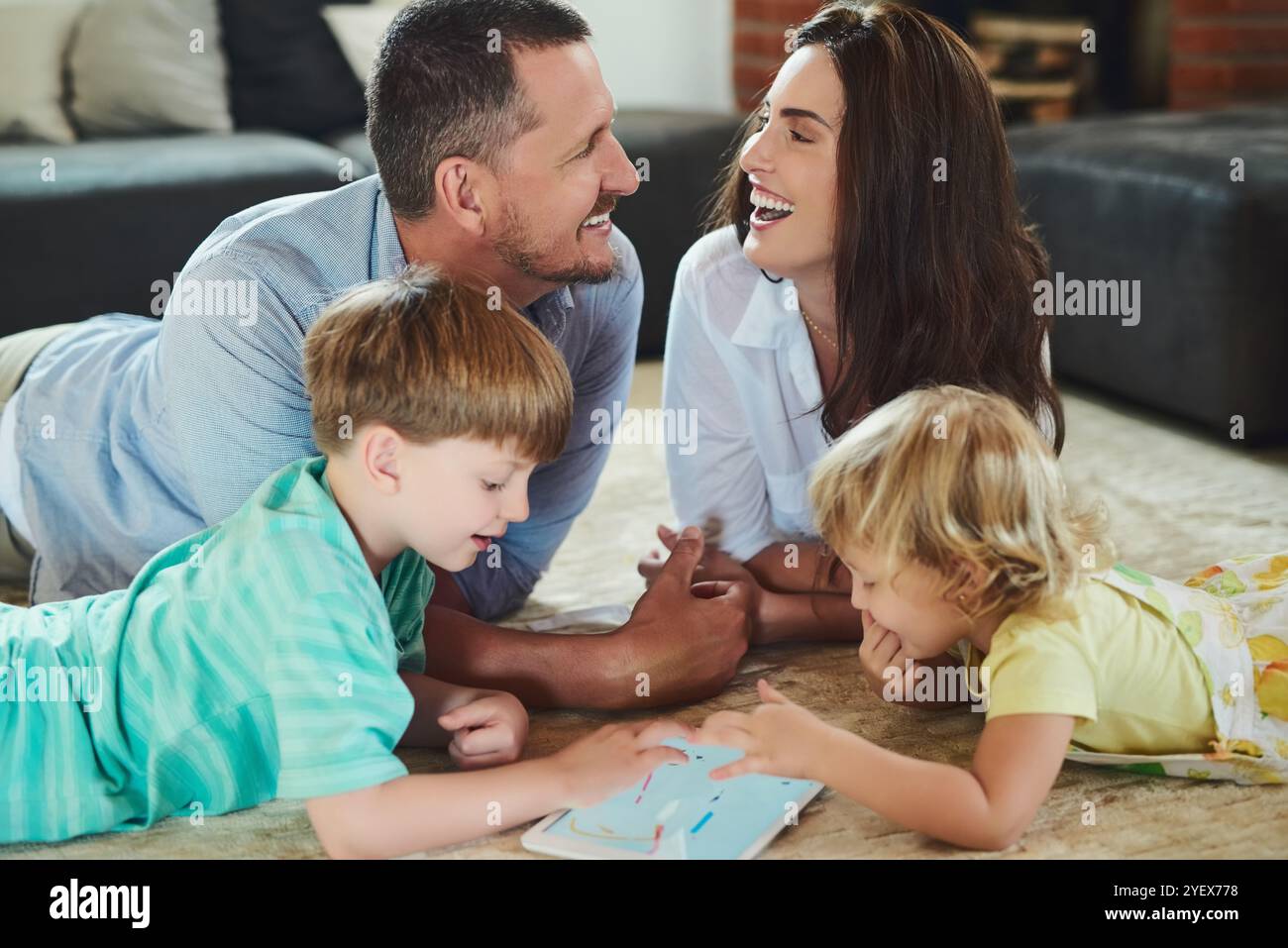 Boy girl playing father watching hi-res stock photography and images ...