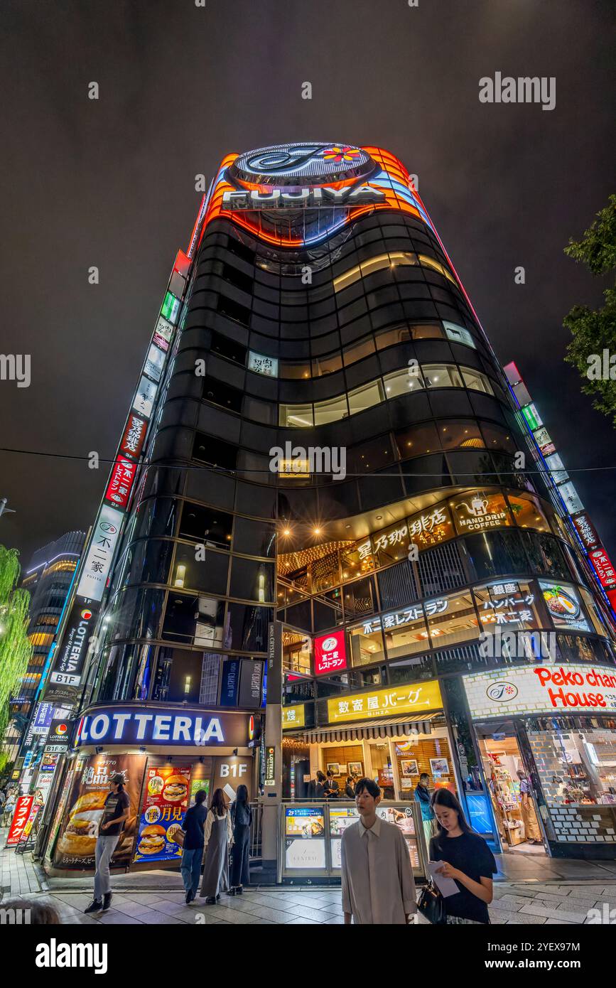 Night scene with brightly lit building in Ginza, Tokyo, Japan on 6 October 2024 Stock Photo - Alamy