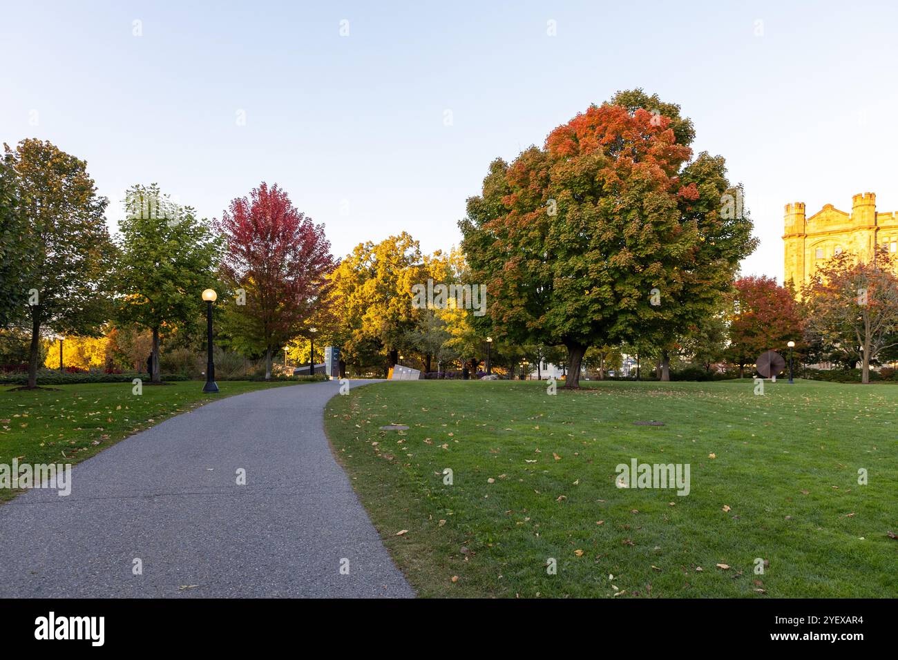 Road in Major's Hill Park in downtown Ottawa, Canada, in autumn season with trees changing ...