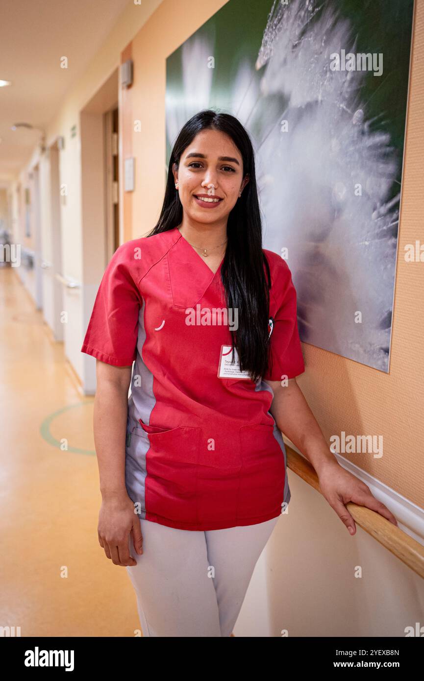 Berlin, Germany. 31st Oct, 2024. Teyssir Ben Rejeb, a nurse, stands in ...