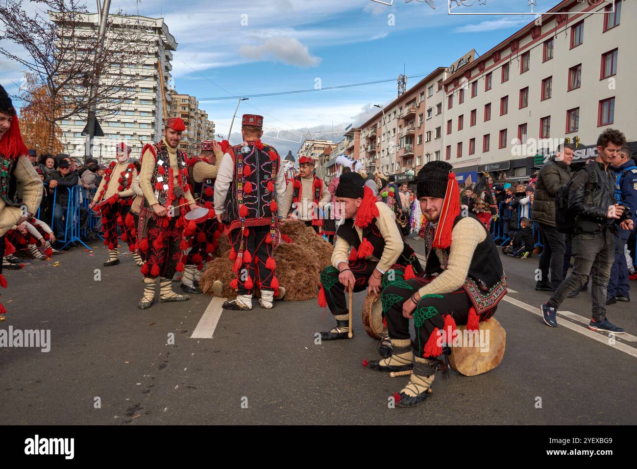 Bacau, Romania, December 2023, people dressed in impressive masks and ...