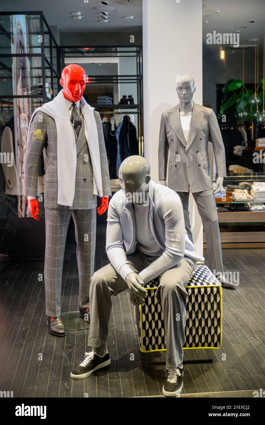 Dressed dummies selling men's fashion in a Den Haag shop window at ...