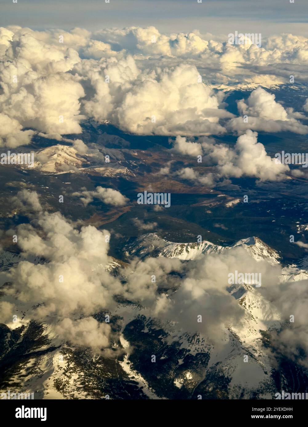 Blue sky with clouds ahead, beyond, above and below are viewed from an ...