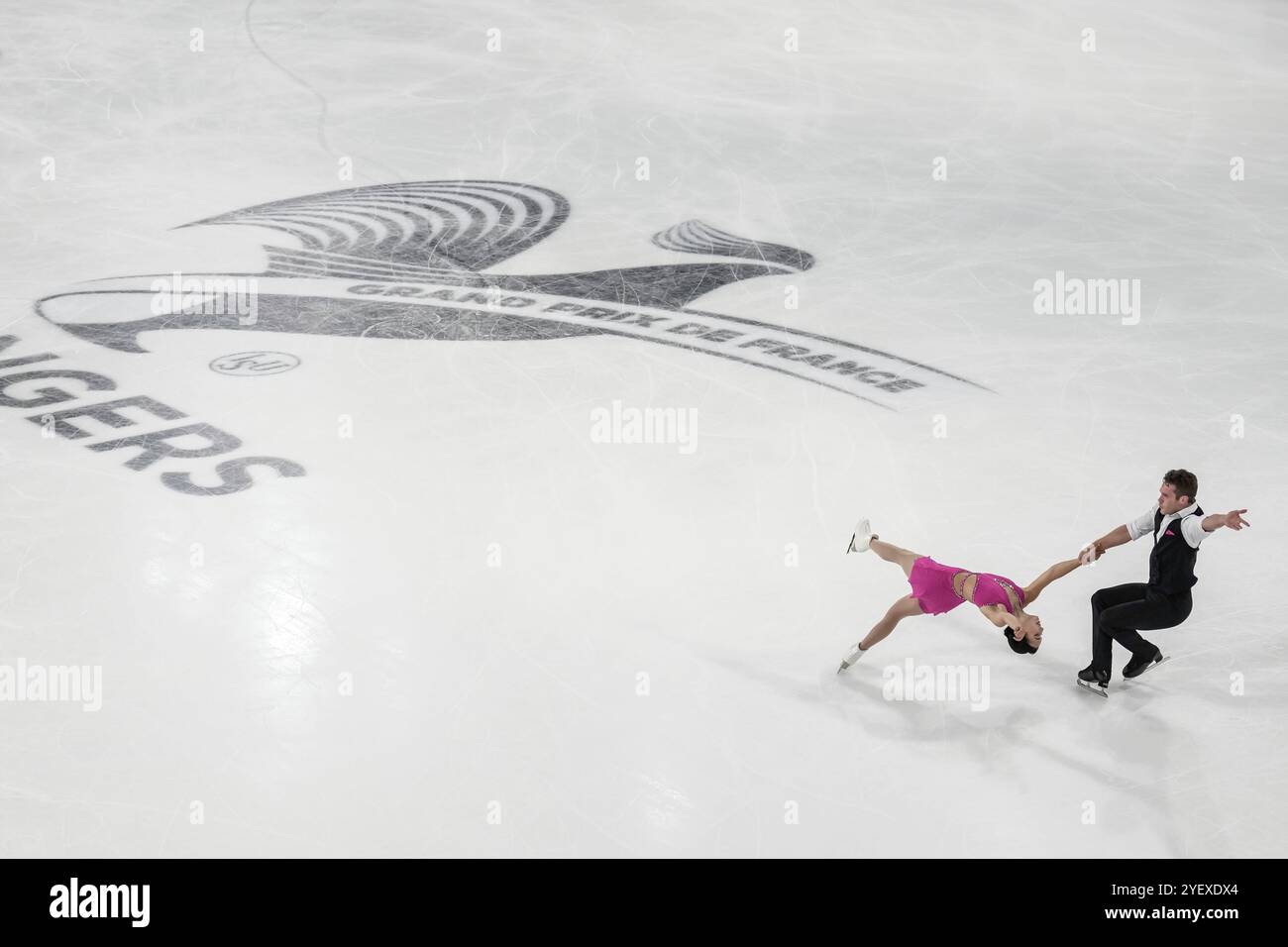 Lia Pereira and Trennt Michaud, of Canada, compete in the pair's short ...