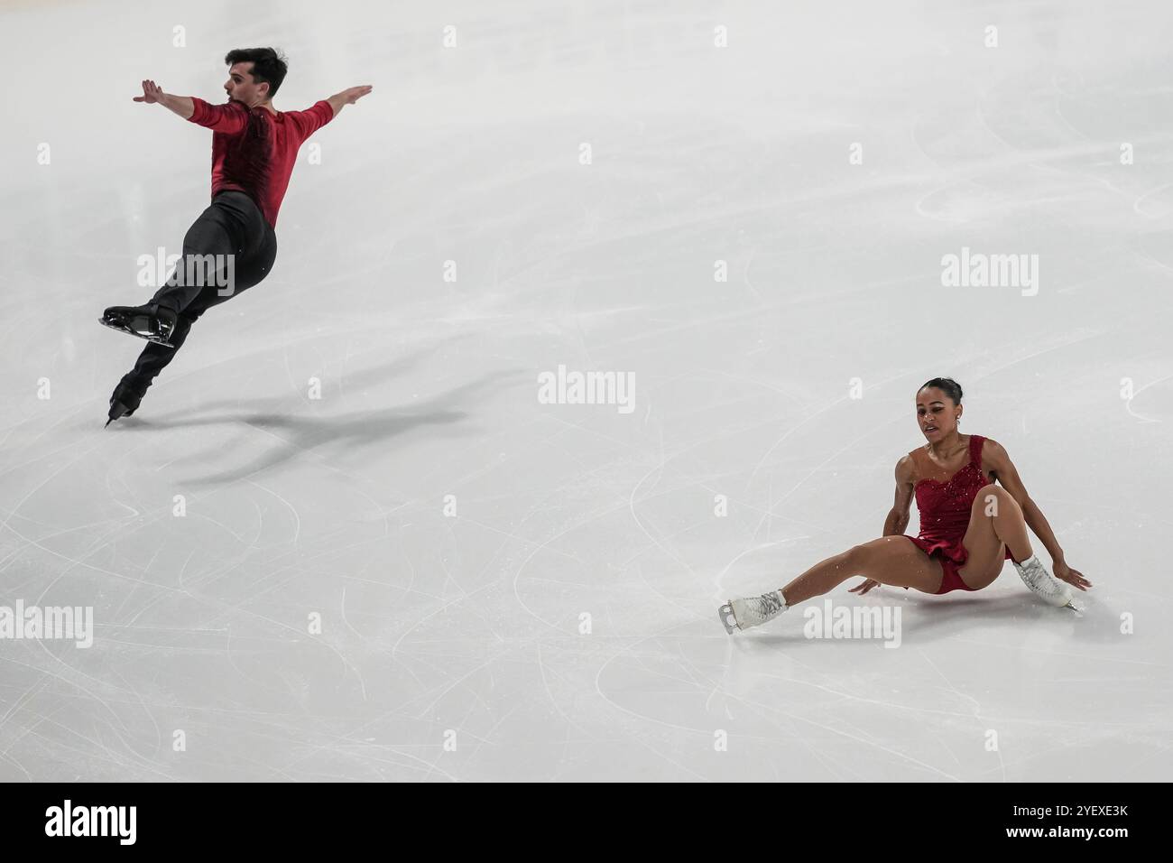 Aurelie Faula and Theo Belle, of France, fall to the ground during the ...