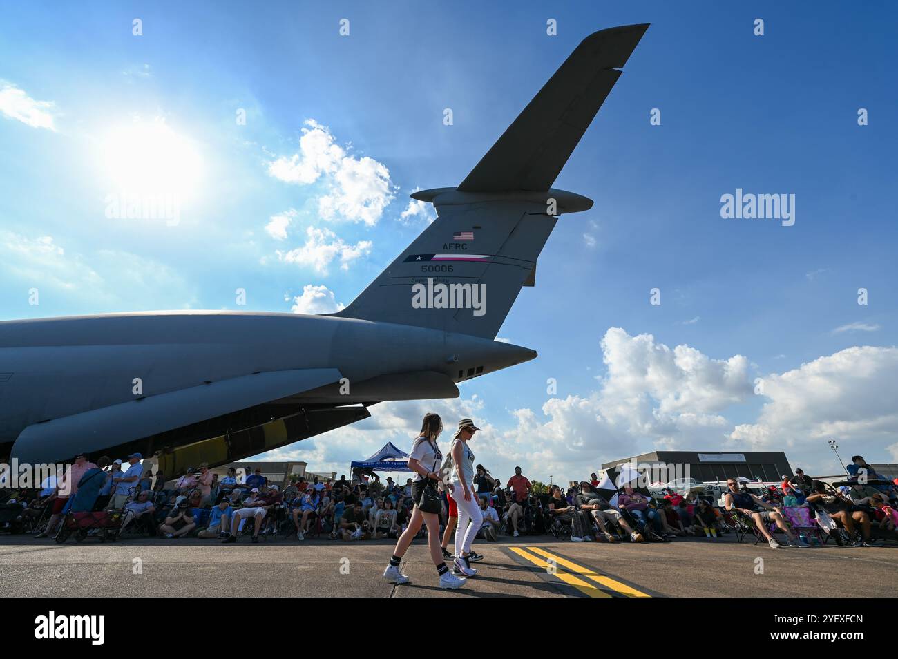 Guests at the Wings Over Houston Airshow gather in the shade provided ...