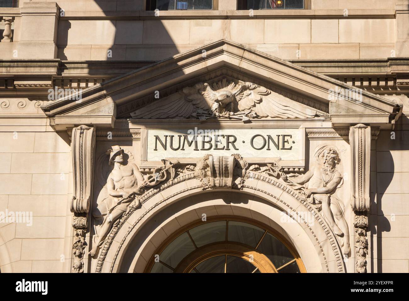 number one carved in stone above doorway of the building No.1 Broadway ...