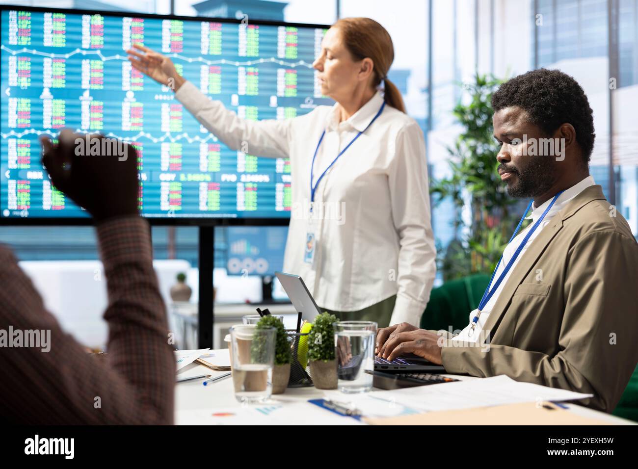 African sales man showing company hi-res stock photography and images ...